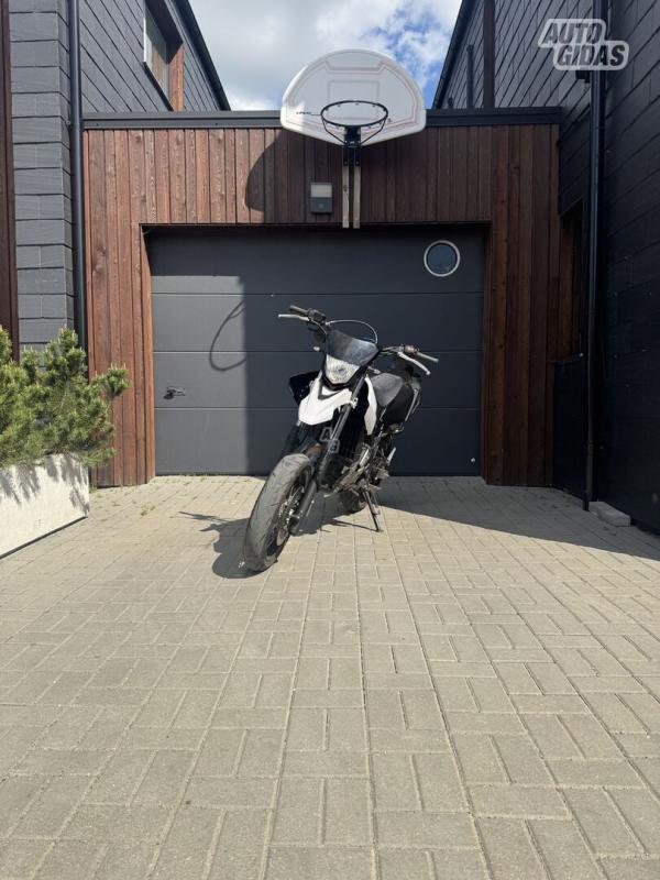Melns Yamaha WR 125X 2012 Kauņa, ar dzinēja tilpumu 0.13 L un nobraukumu 23 tūkst. km par 2200 €, foto 3 vietnē AUTOMOTO.COM.LV
