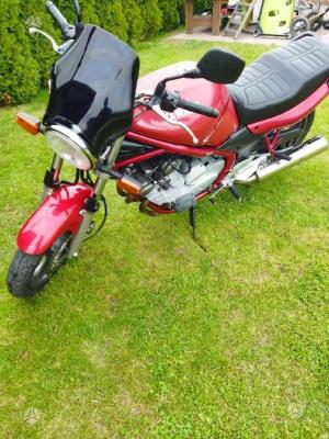 Sarkans Yamaha XJ 600 2000 Utena, ar dzinēja tilpumu 0.60 L un nobraukumu 46 tūkst. km par 1050 €, foto  vietnē AUTOMOTO.COM.LV