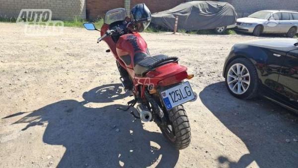 Sarkans Yamaha XJ 600 2000 Kauņa, ar dzinēja tilpumu 0.60 L un nobraukumu 41 tūkst. km par 1200 €, foto 6 vietnē AUTOMOTO.COM.LV