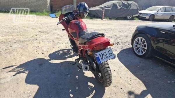 Sarkans Yamaha XJ 600 2001 Kauņa, ar dzinēja tilpumu 0.60 L un nobraukumu 46 tūkst. km par 1200 €, foto 5 vietnē AUTOMOTO.COM.LV