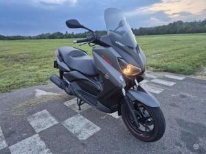 Black Yamaha XMAX 250 2014 in Kaunas, with an engine capacity of 0.25 L and mileage of 18 thousand km for 2799 €, photo 5 on AUTOMOTO.COM.LV