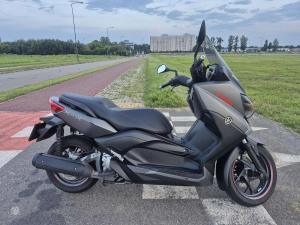 Black Yamaha XMAX 250 2014 in Kaunas, with an engine capacity of 0.25 L and mileage of 18 thousand km for 2799 €, photo 12 on AUTOMOTO.COM.LV