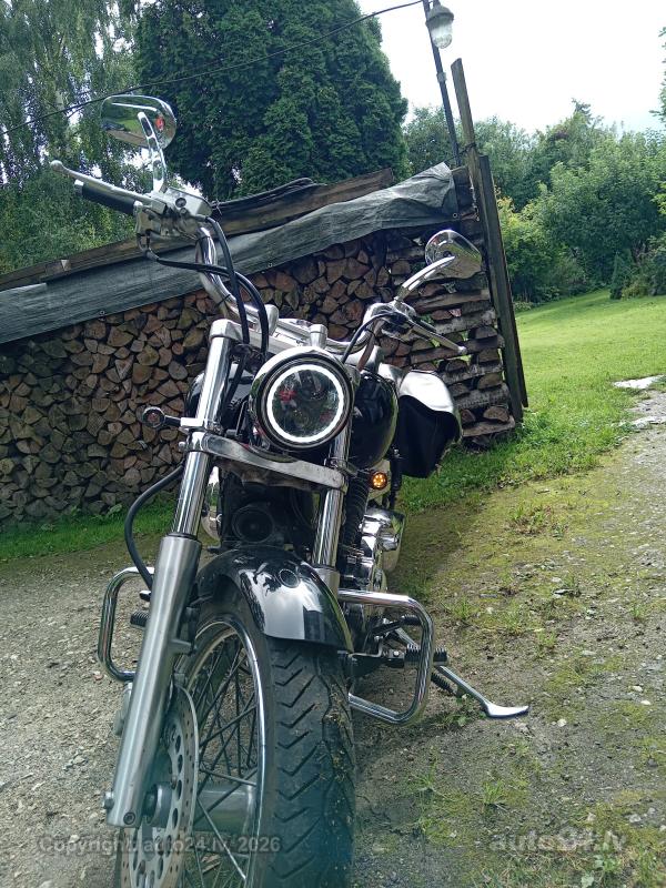 Melns Yamaha XVS 650 2000 Tiri, ar dzinēja tilpumu 0.65 L un nobraukumu 43 tūkst. km par 3000 €, foto 4 vietnē AUTOMOTO.COM.LV