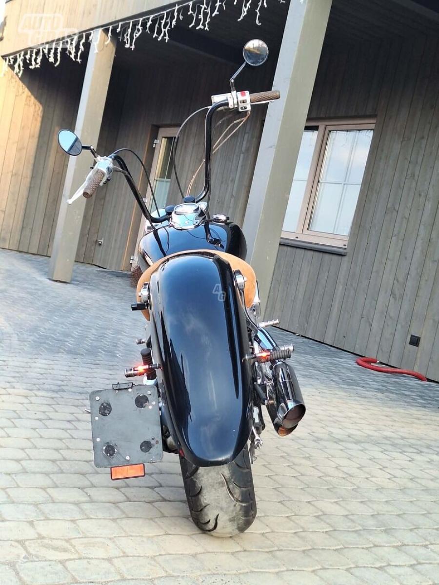 Black Yamaha XVS 2000 in Jurbarkas, with an engine capacity of 0.65 L and mileage of 31 thousand km for 3000 €, photo 5 on AUTOMOTO.COM.LV