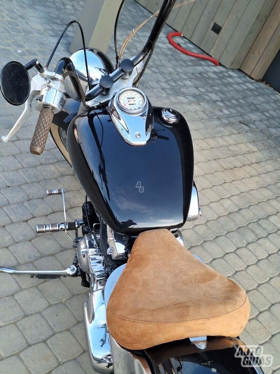 Black Yamaha XVS 2000 in Jurbarkas, with an engine capacity of 0.65 L and mileage of 31 thousand km for 3000 €, photo 24 on AUTOMOTO.COM.LV