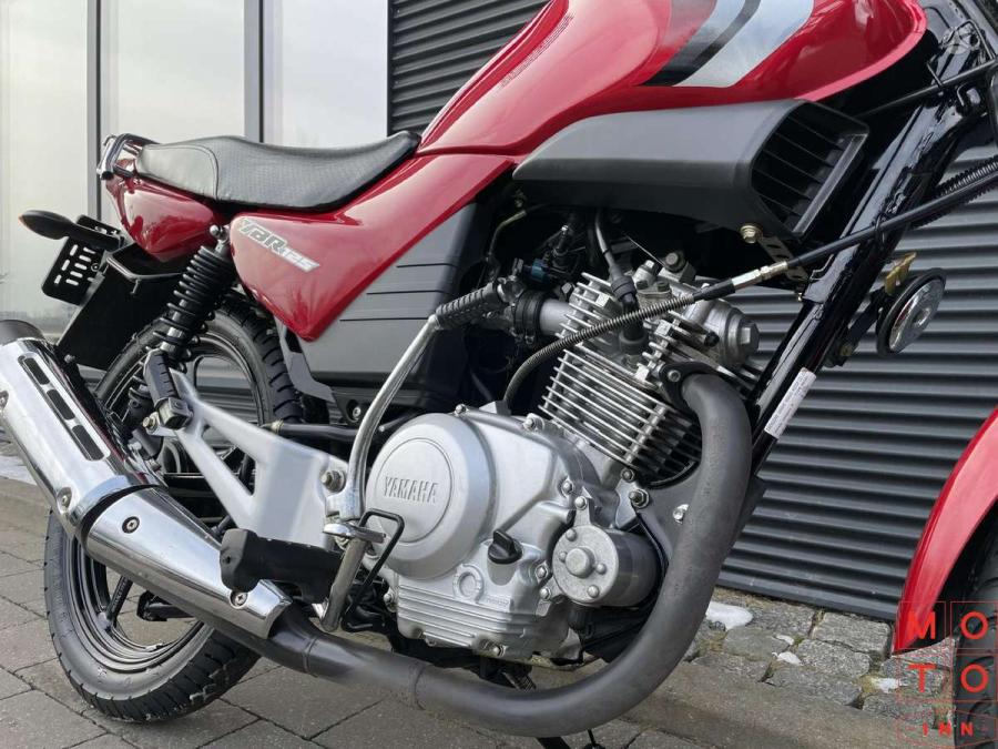 Red Yamaha YBR 2008 in Riga, with an engine capacity of 0.13 L and mileage of 25 thousand km for 1699 €, photo 16 on AUTOMOTO.COM.LV