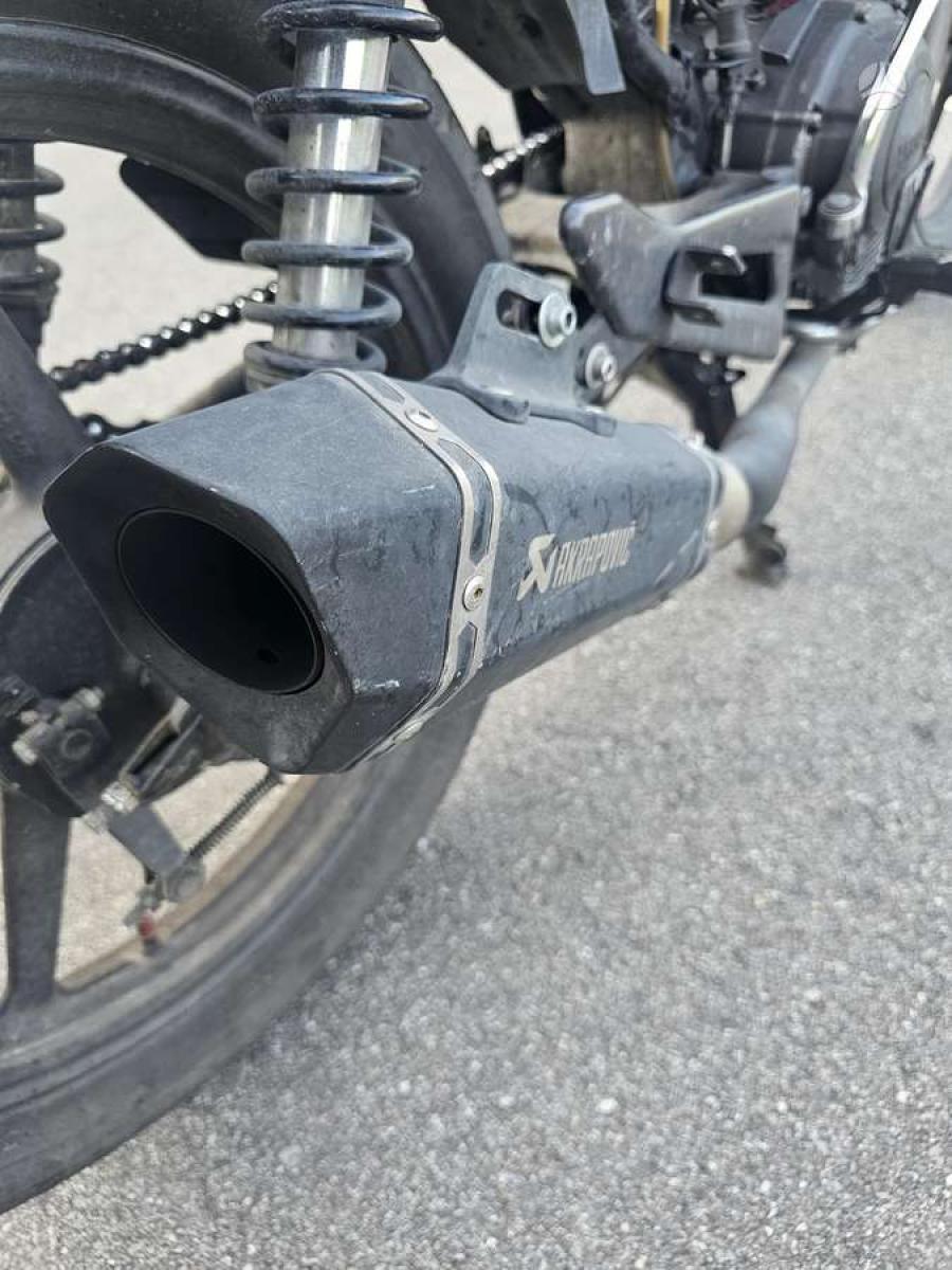 Red Yamaha YBR 2008 in Kaunas, with an engine capacity of 0.13 L and mileage of 61 thousand km for 1500 €, photo 14 on AUTOMOTO.COM.LV