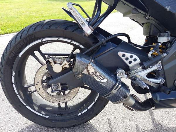Black Yamaha YZF 2009 in Mazeikiai, with an engine capacity of 0.13 L and mileage of 65 thousand km for 1200 €, photo 6 on AUTOMOTO.COM.LV