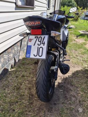 Melns Yamaha YZF 2009 Kauņa, ar dzinēja tilpumu 0.13 L un nobraukumu 25 tūkst. km par 1800 €, foto 6 vietnē AUTOMOTO.COM.LV