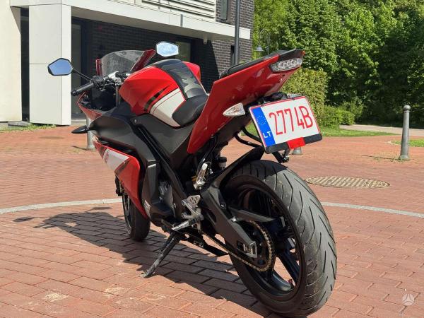 Red Yamaha YZF 2010 in Vilnius, with an engine capacity of 0.13 L and mileage of 39 thousand km for 2300 €, photo 4 on AUTOMOTO.COM.LV