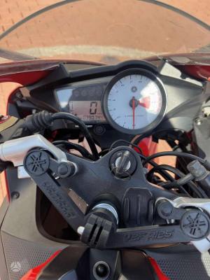 Red Yamaha YZF 2010 in Vilnius, with an engine capacity of 0.13 L and mileage of 39 thousand km for 2300 €, photo 13 on AUTOMOTO.COM.LV