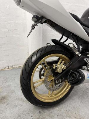 White Yamaha YZF 2013 in Marijampole, with an engine capacity of 0.13 L and mileage of 21 thousand km for 1890 €, photo 12 on AUTOMOTO.COM.LV