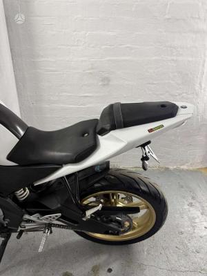 White Yamaha YZF 2013 in Marijampole, with an engine capacity of 0.13 L and mileage of 21 thousand km for 1890 €, photo 17 on AUTOMOTO.COM.LV